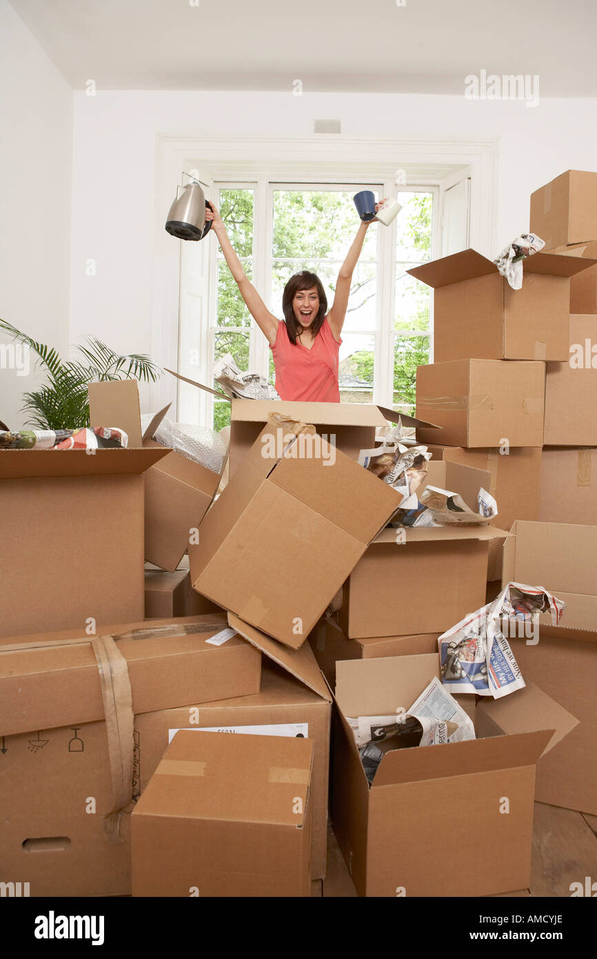 Hand breaking out of a box hi-res stock photography and images - Alamy