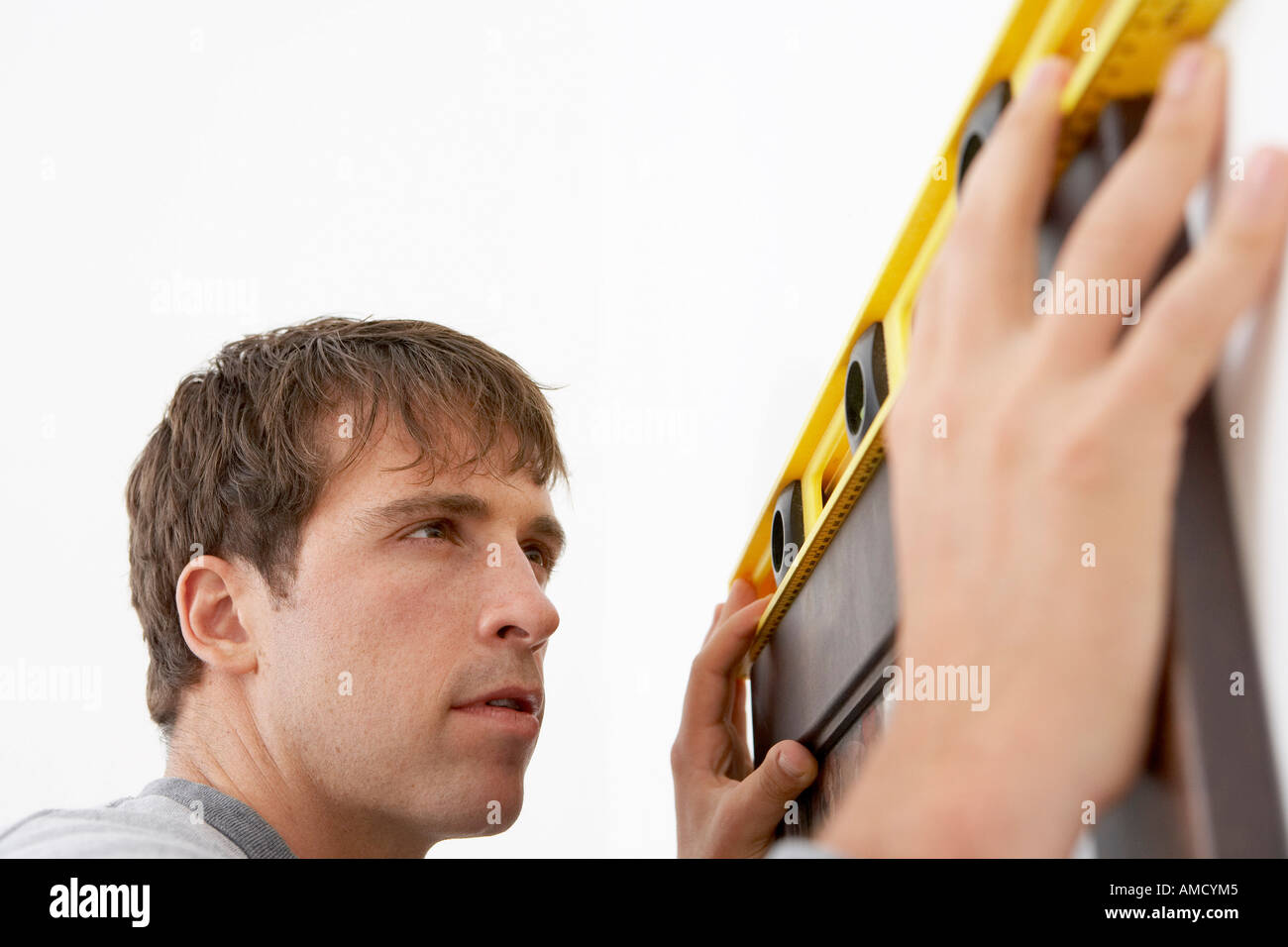 Man Hanging Picture Stock Photo - Alamy