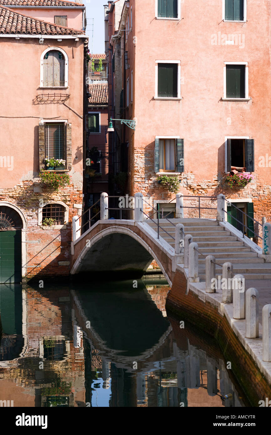 Footbridge with steps over water with historic buildings Stock Photo ...