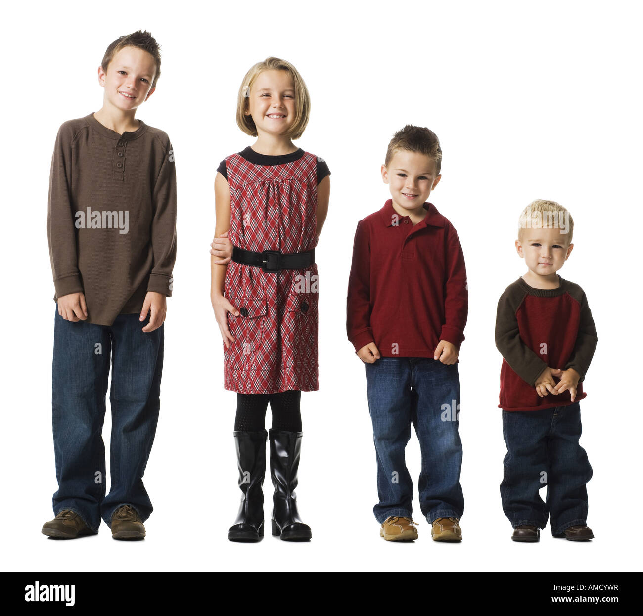 Four children posing and smiling Stock Photo - Alamy