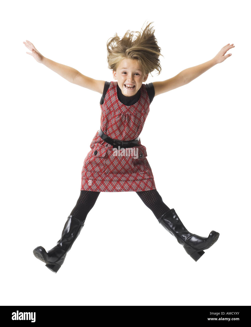 Girl smiling and leaping Stock Photo - Alamy