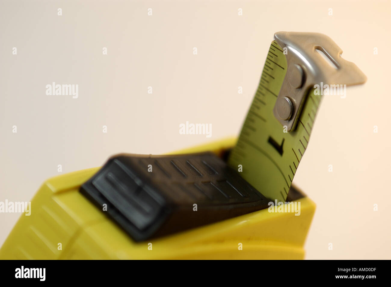 Measuring tape yellow color clean background Stock Photo - Alamy