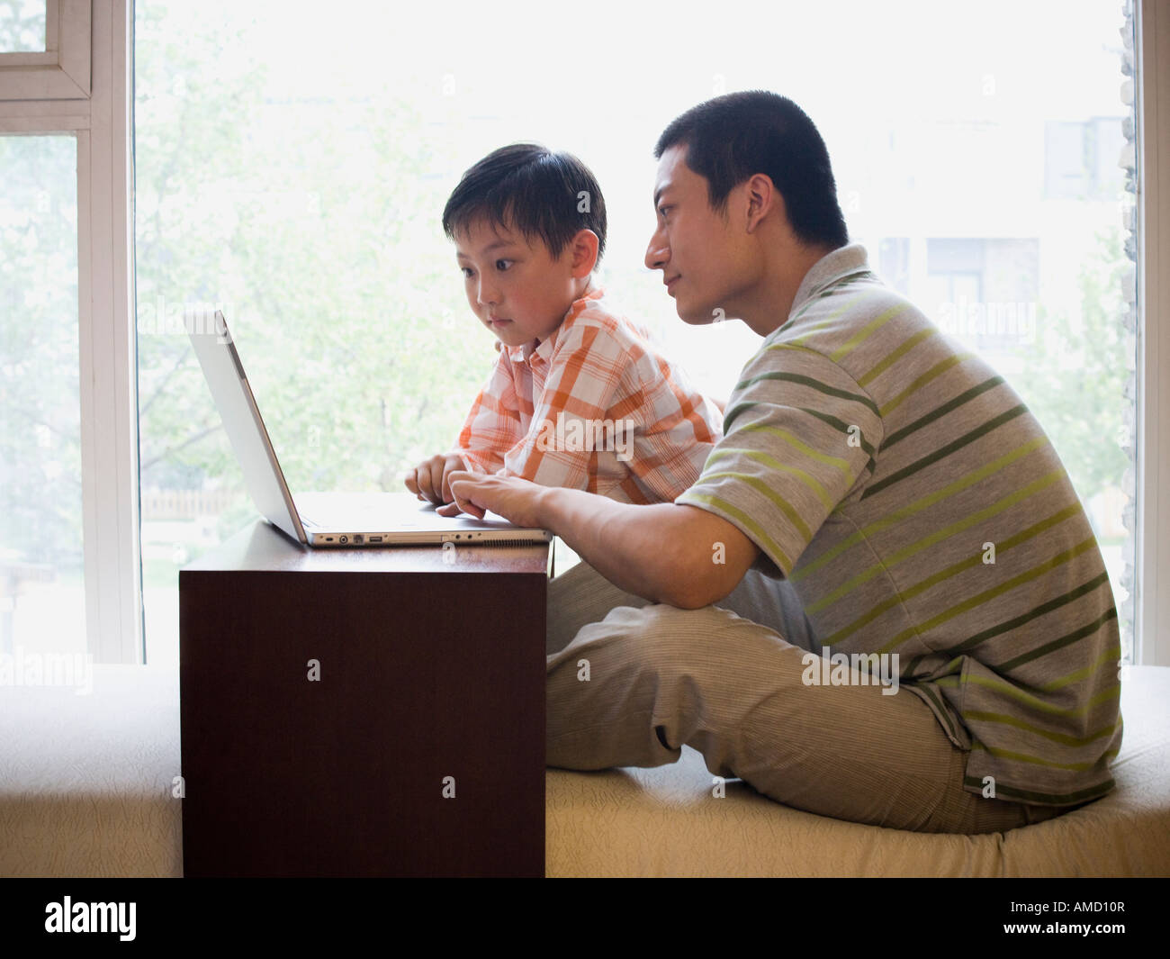 Chinese boy profile hi-res stock photography and images - Alamy