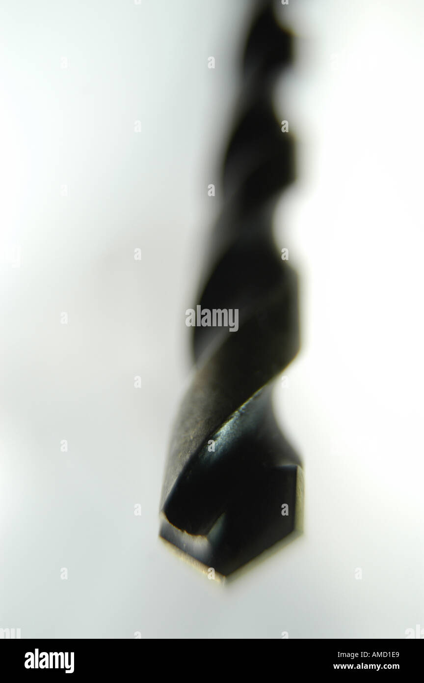 A close-up of a drill bit on a white background Stock Photo - Alamy
