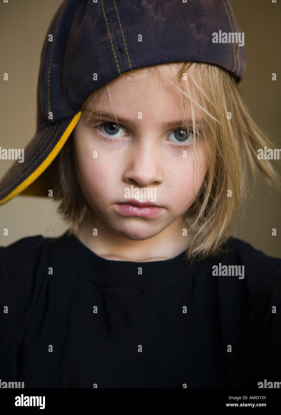 Closeup of boy with baseball cap Stock Photo - Alamy