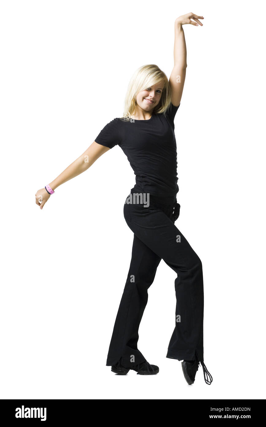 Woman dancing and smiling Stock Photo - Alamy