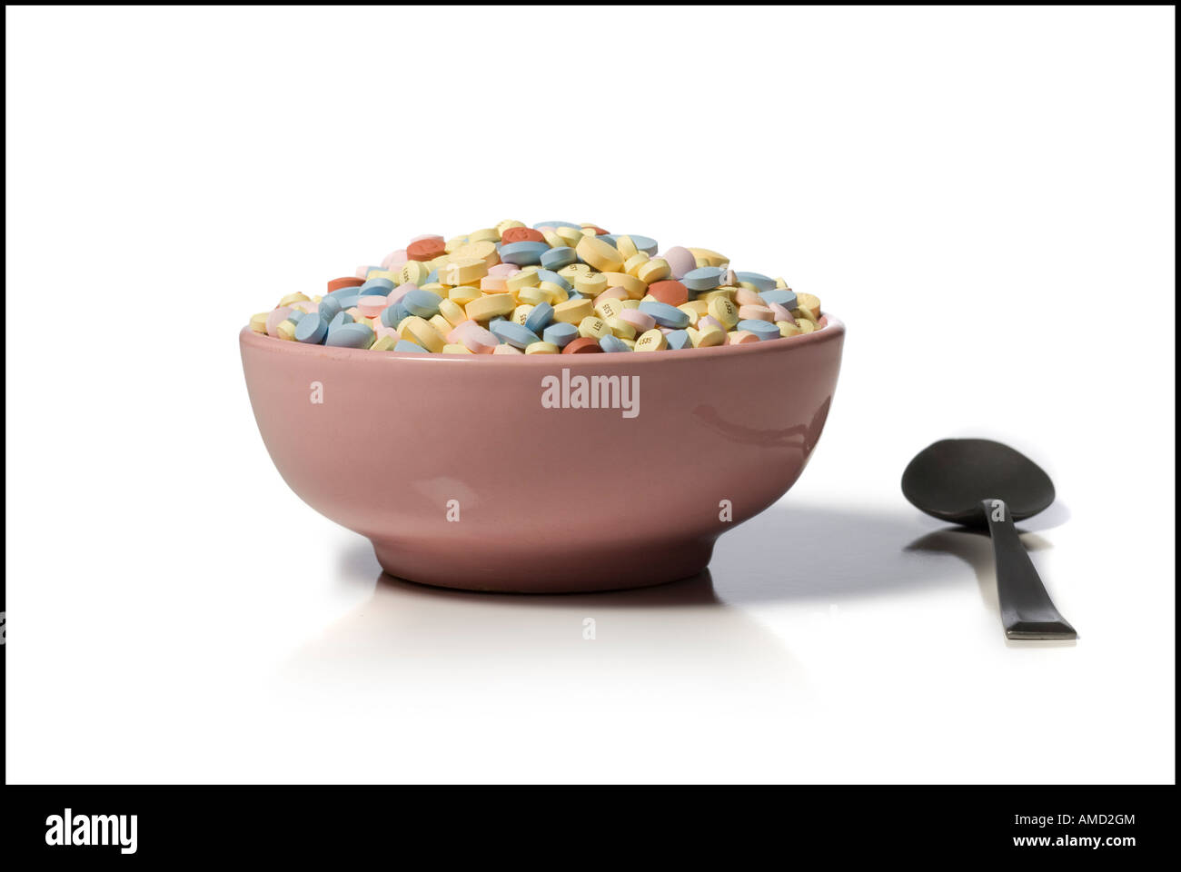 Bowl filled with medication with spoon Stock Photo - Alamy
