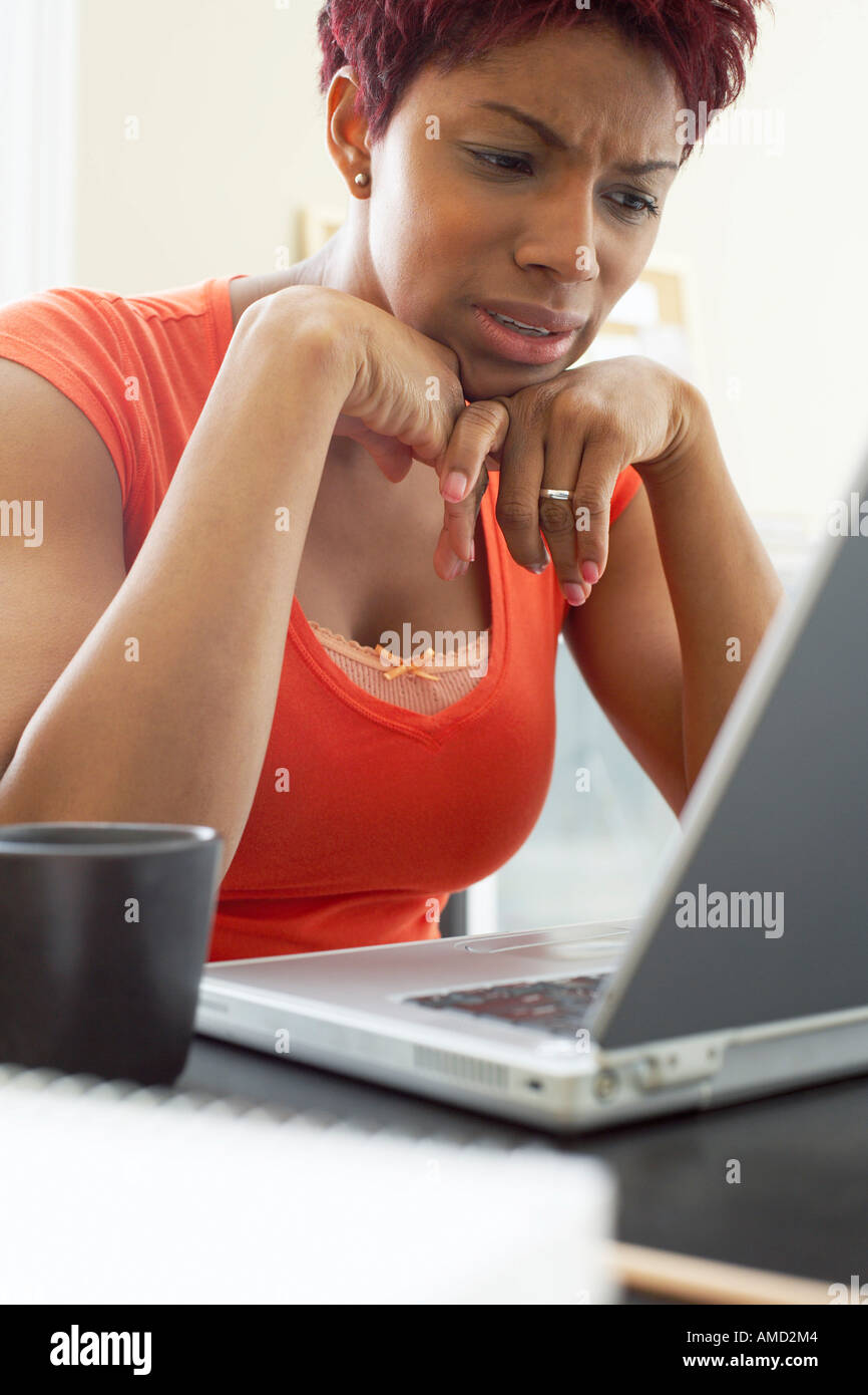 African american woman computer mad hi-res stock photography and images ...