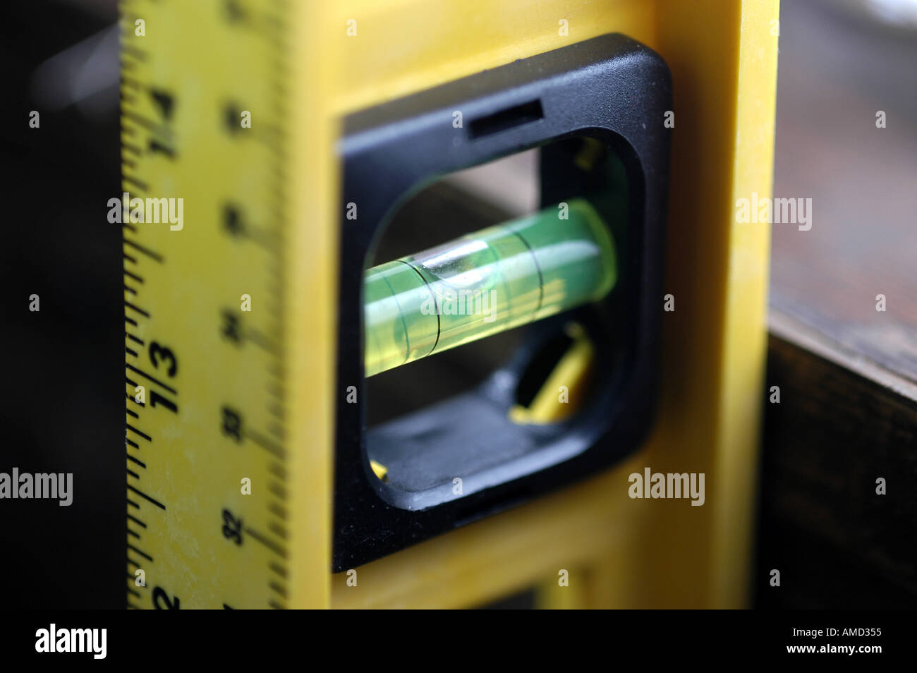 Equilibrium scale balance tool yellow Stock Photo - Alamy
