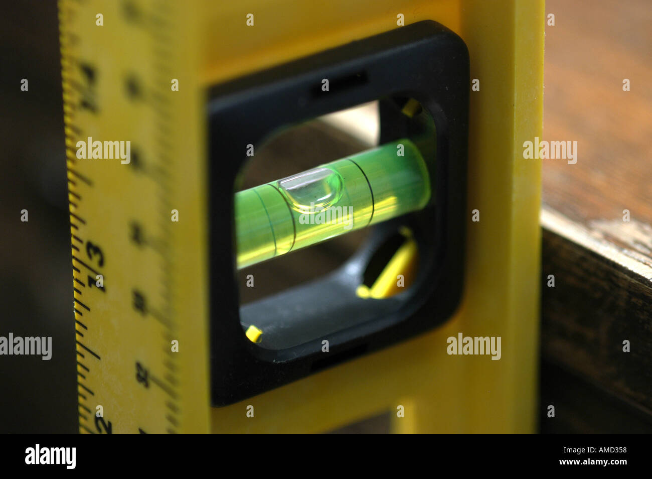 Equilibrium scale balance tool yellow Stock Photo - Alamy