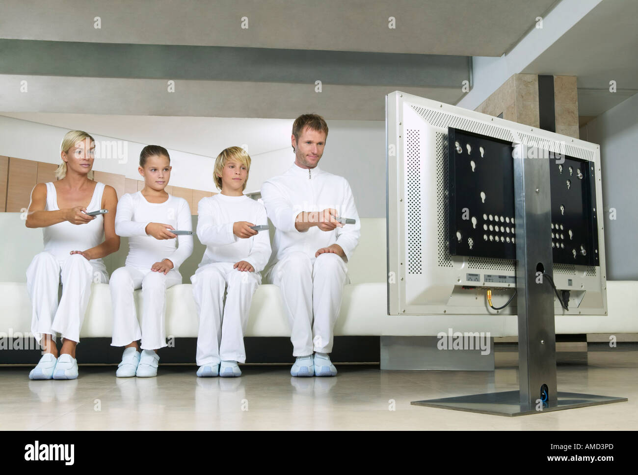 Tv remote control family serious hi-res stock photography and images ...