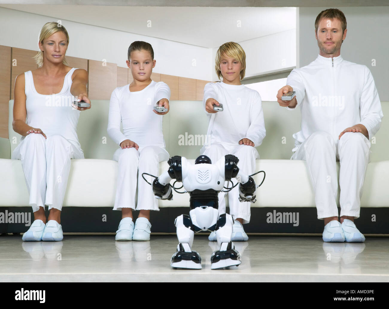 Tv remote control family serious hi-res stock photography and images ...