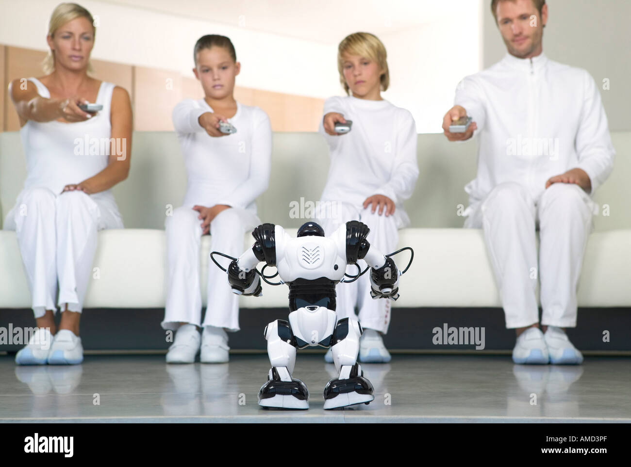 Tv remote control family serious hi-res stock photography and images ...