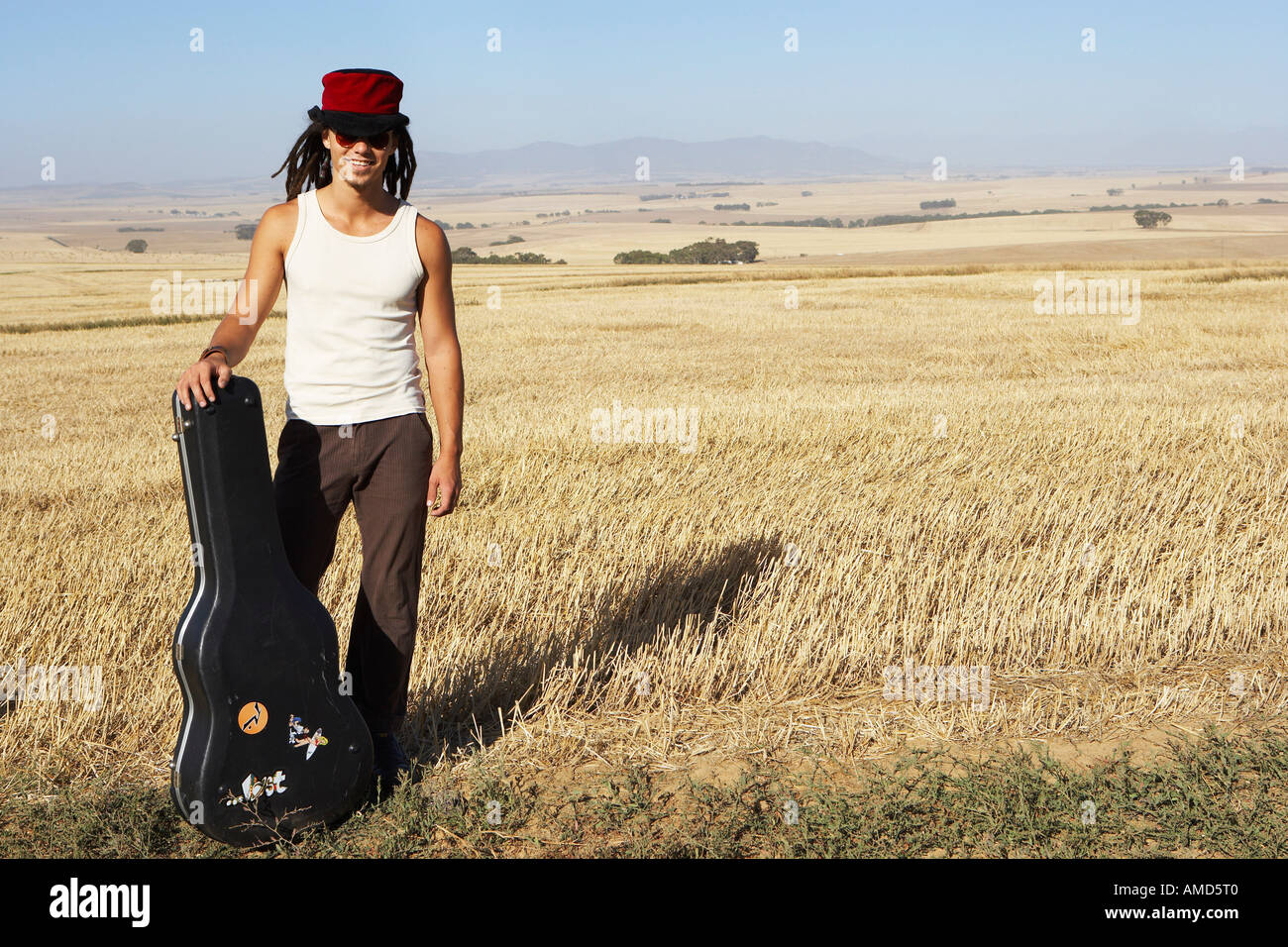 Man Standing In Field Guitar High Resolution Stock Photography and ...