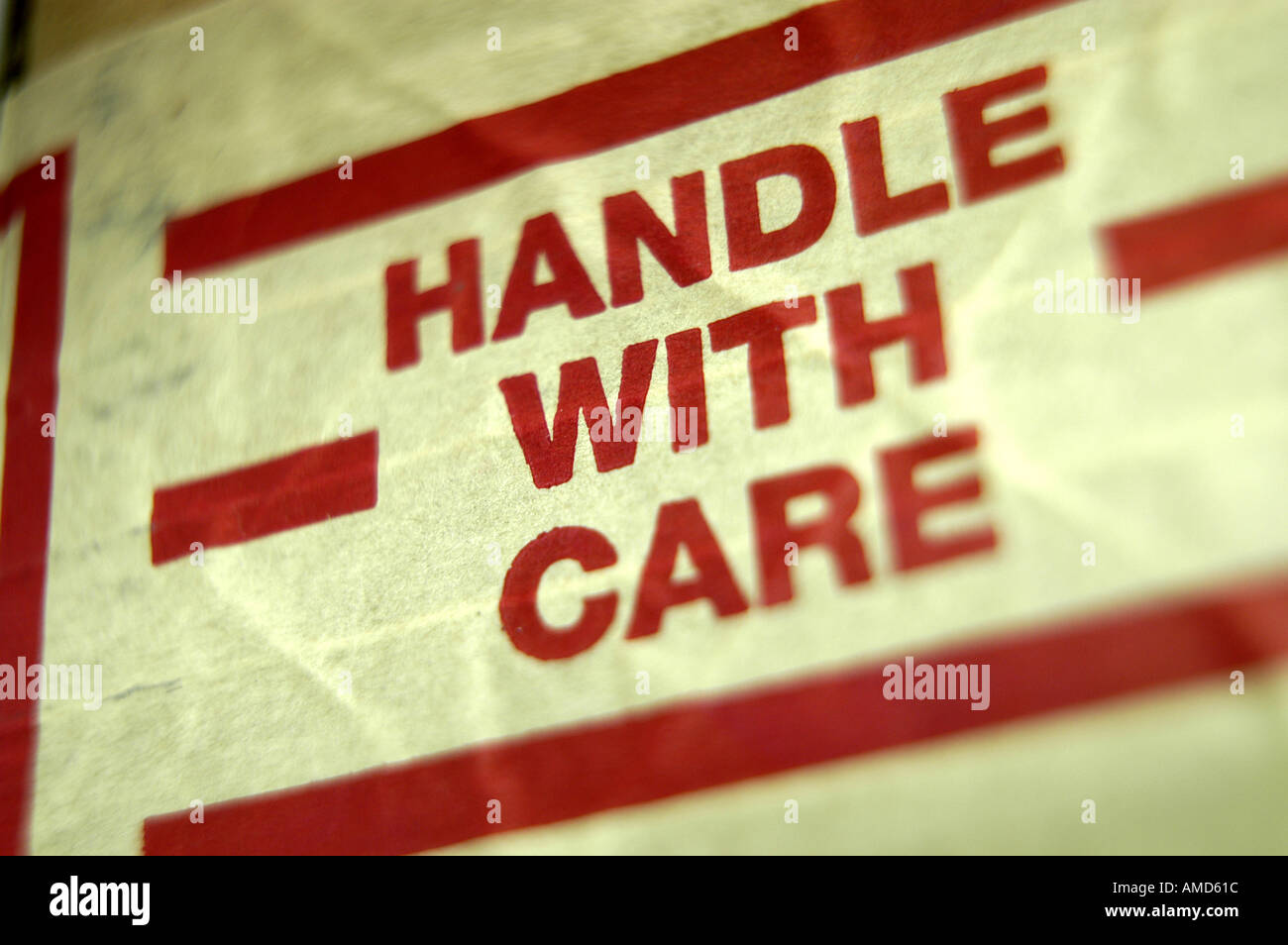 Warning sign handle care Stock Photo - Alamy