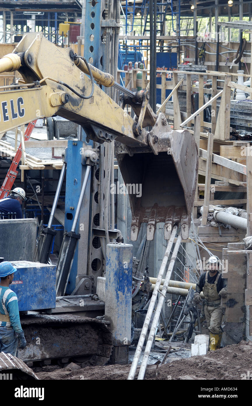 construction machines digging in new york city Usa Stock Photo - Alamy