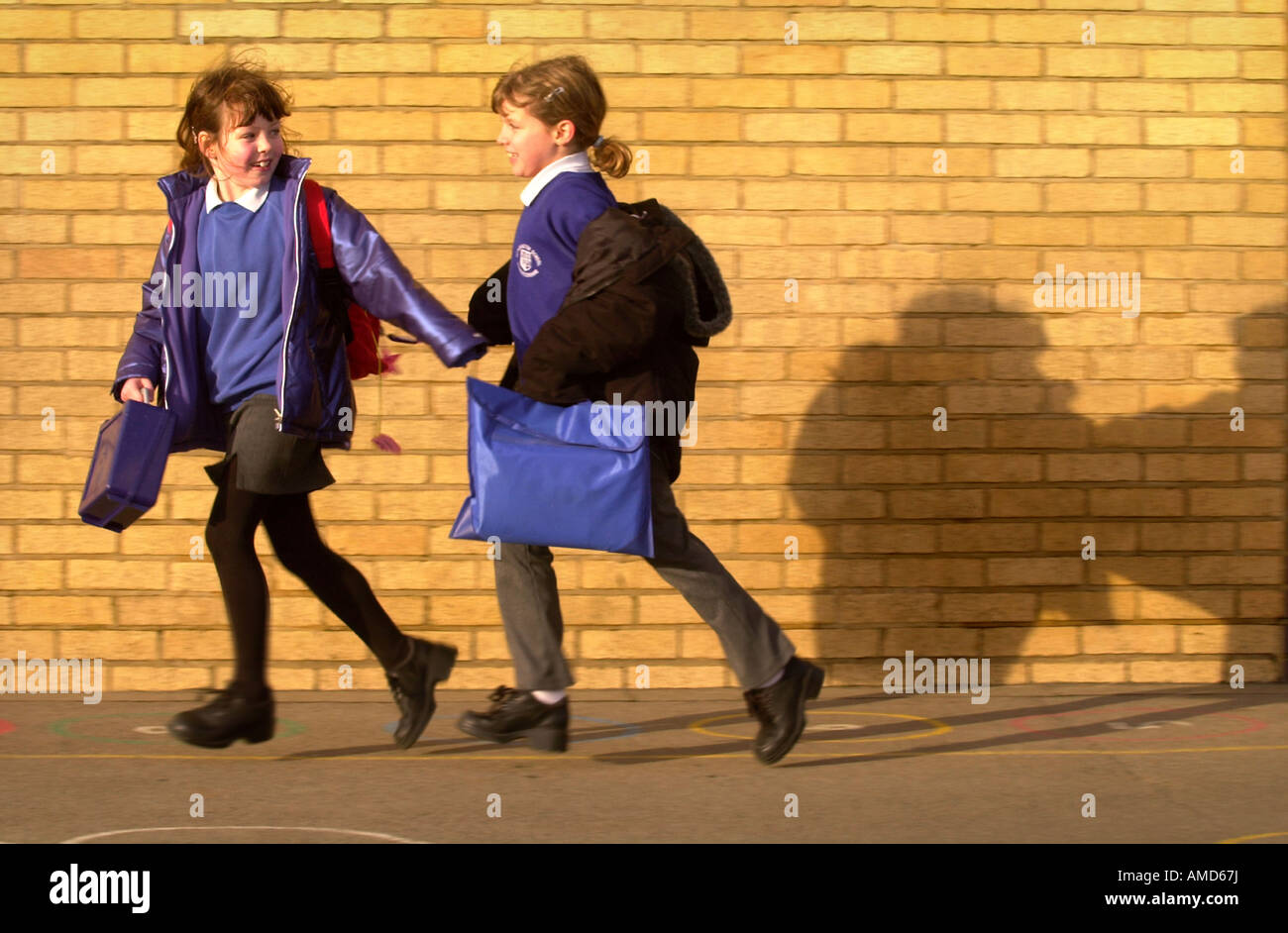 SCHOOL CHILDREN AT HOMETIME Stock Photo - Alamy