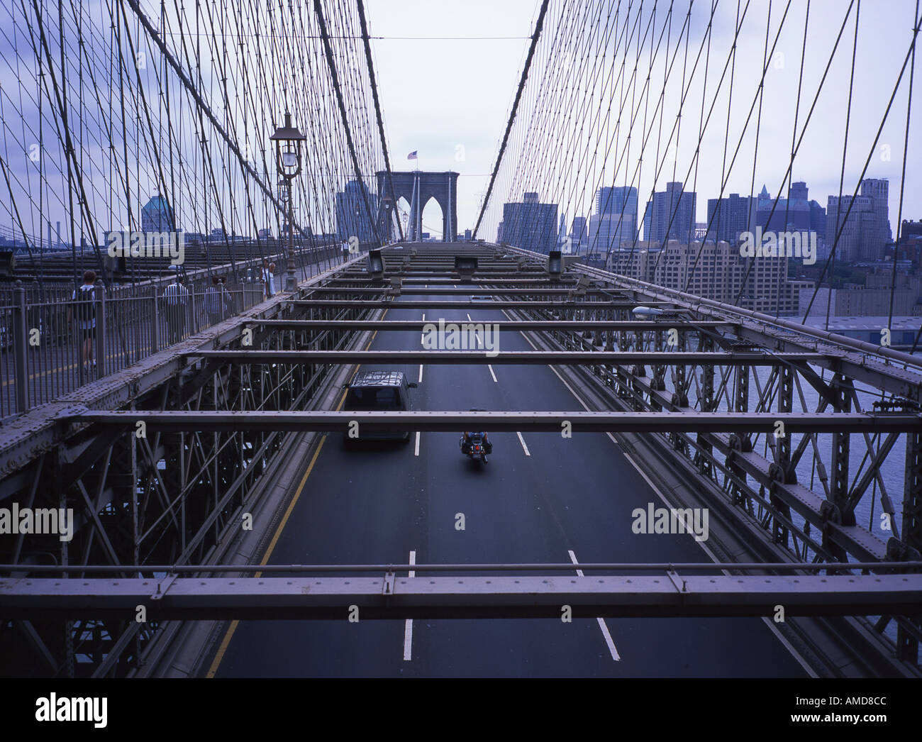 Brooklyn Bridge New York, traffic seen from the pedestrian deck framed ...
