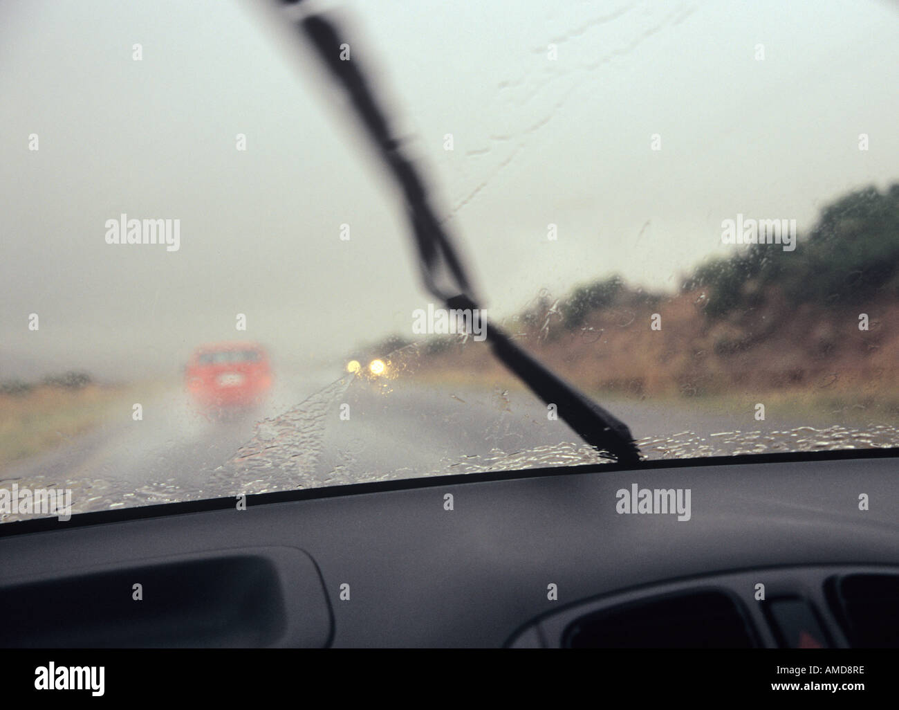 DRIVING in the DRIVING RAIN with windscreen wiper working as seen ...