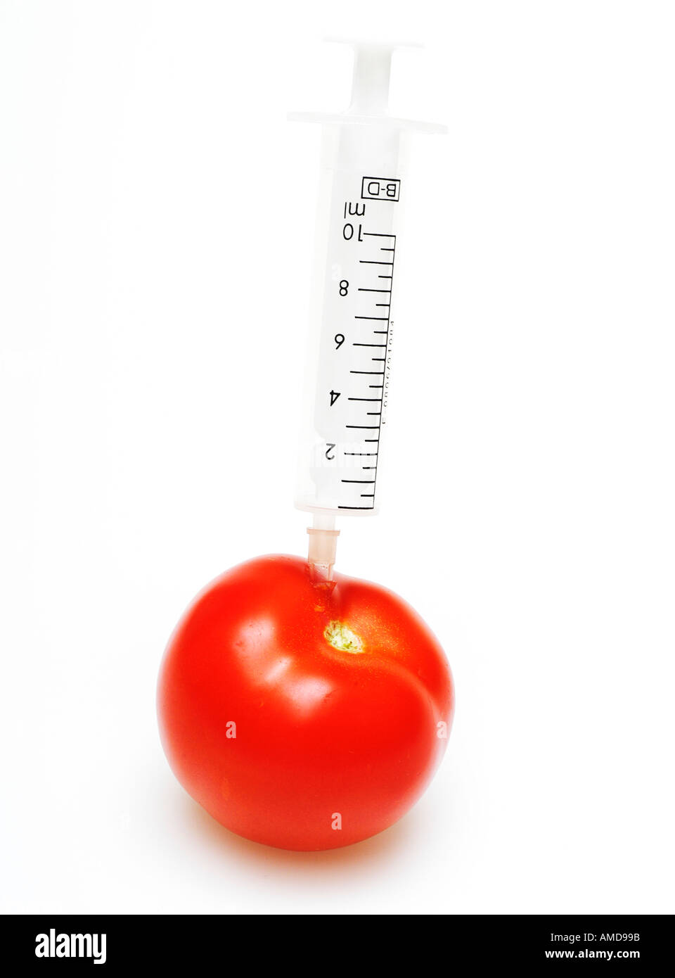 injection in a tomatoe Stock Photo - Alamy