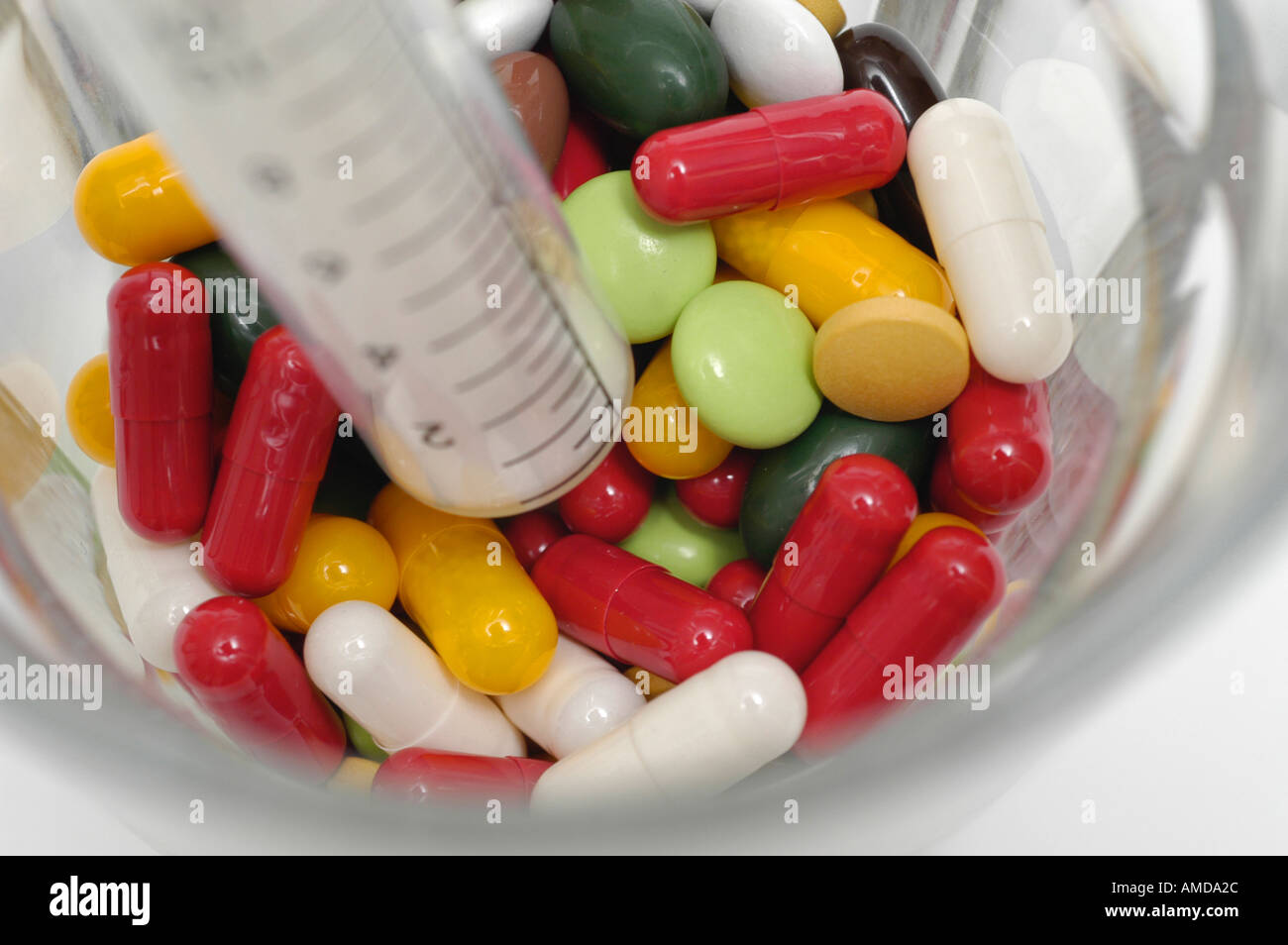 pills and an injection Stock Photo - Alamy