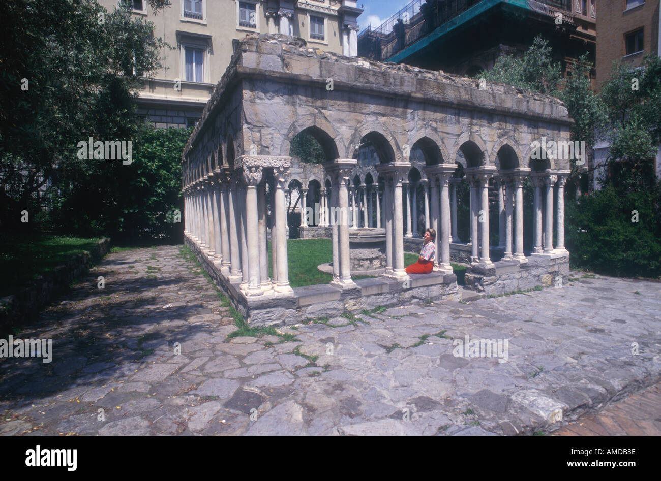 Cloister from th former Monastery of Sant Andrea with a young lady ...