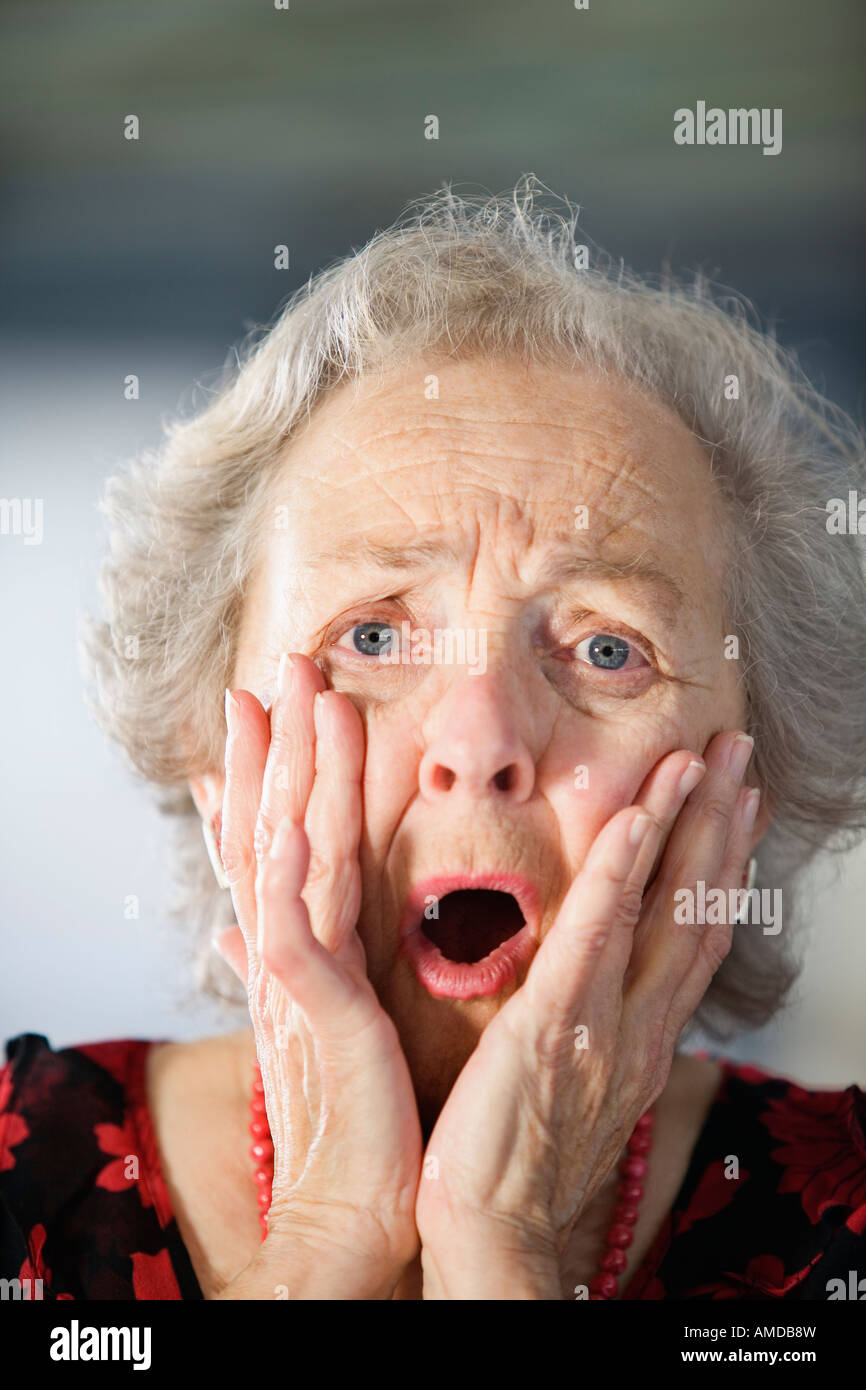 Portrait of a shocked senior woman Stock Photo - Alamy