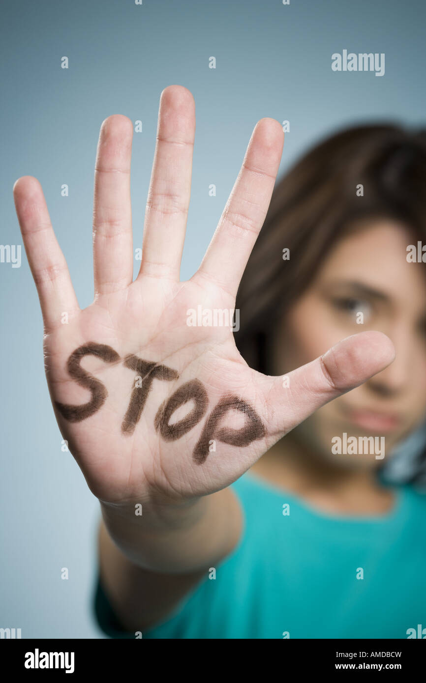 Stop written on hand hi-res stock photography and images - Alamy