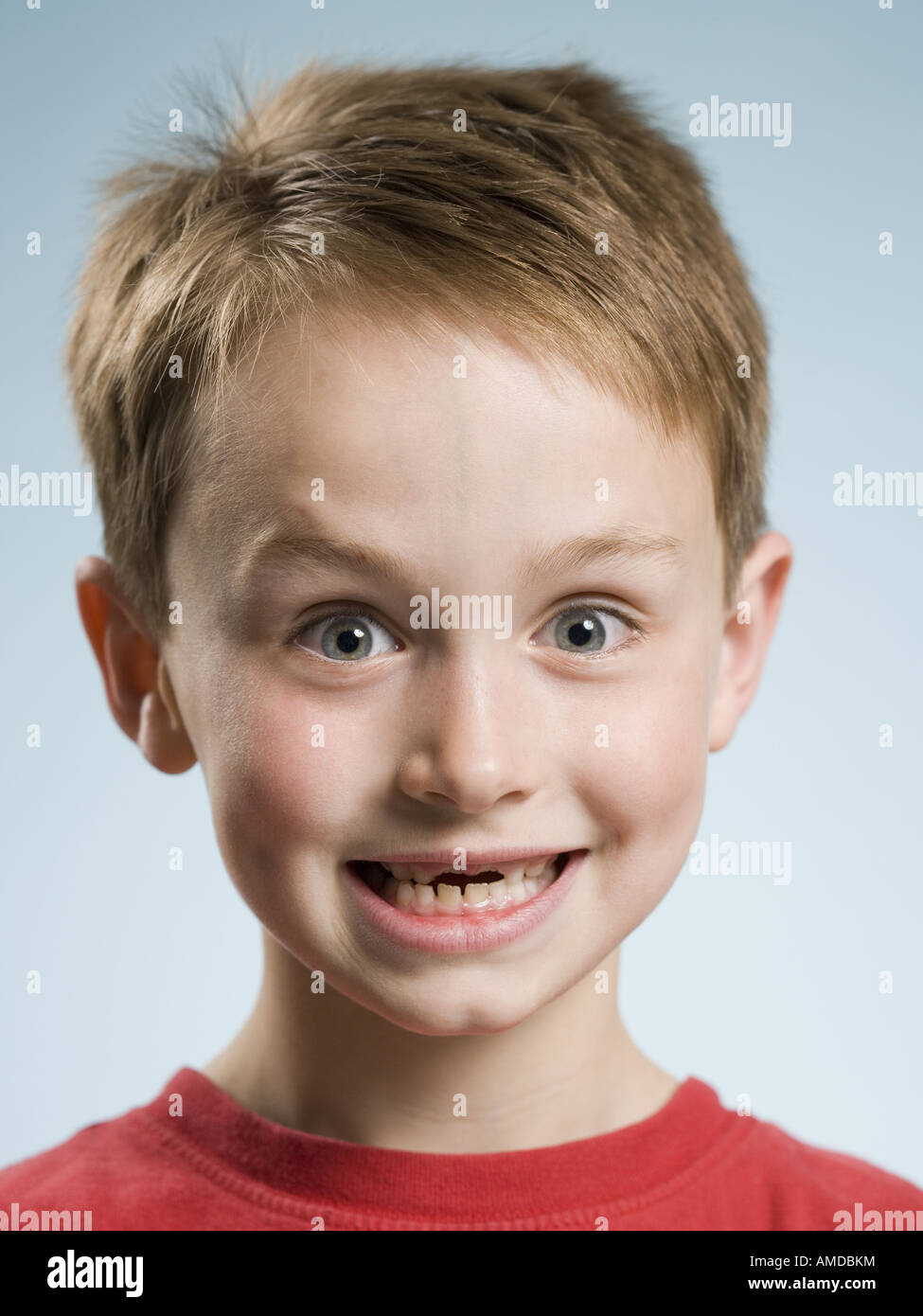 Close-up of boy smiling with missing front teeth Stock Photo - Alamy