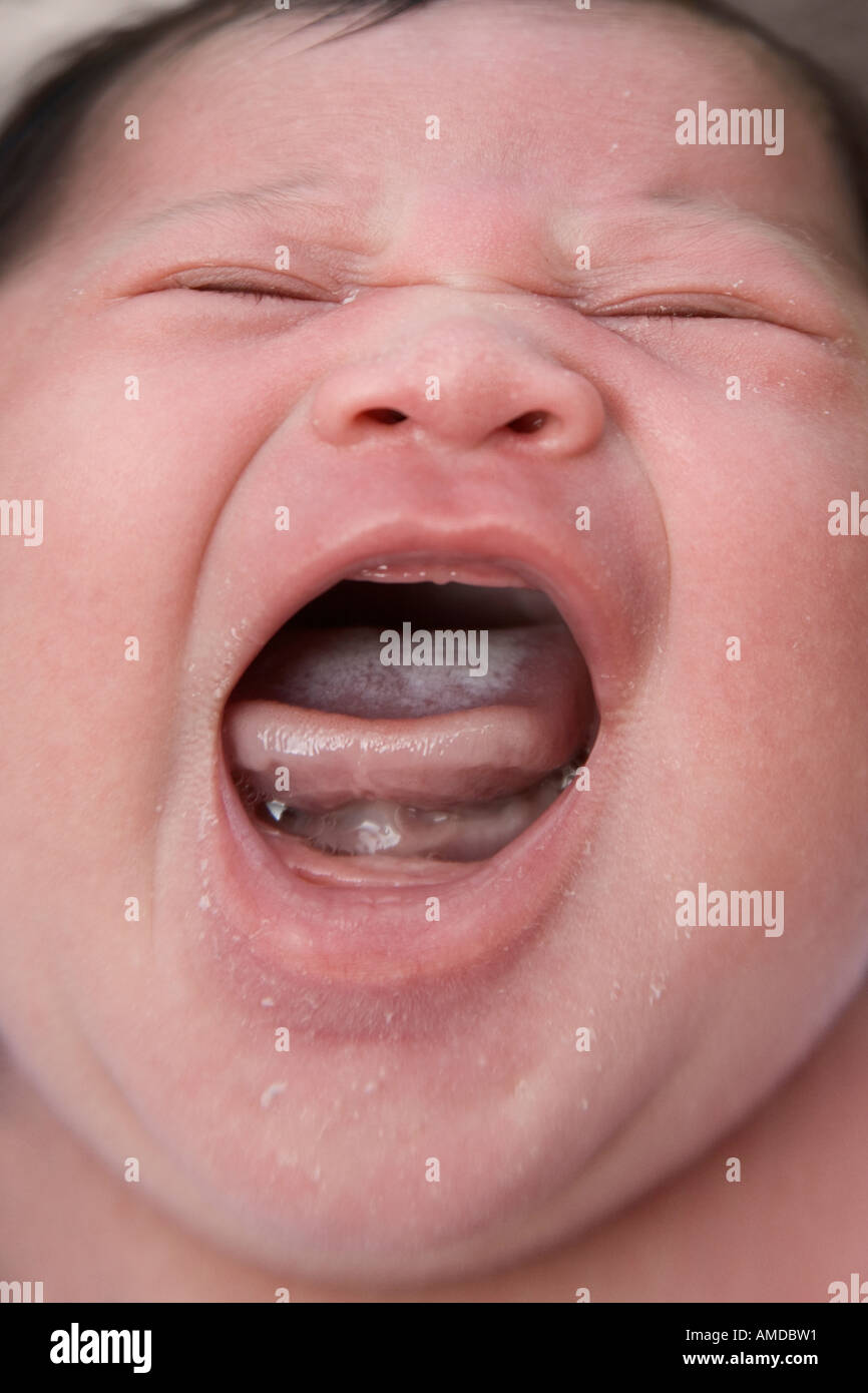 Baby cry cross hi-res stock photography and images - Alamy