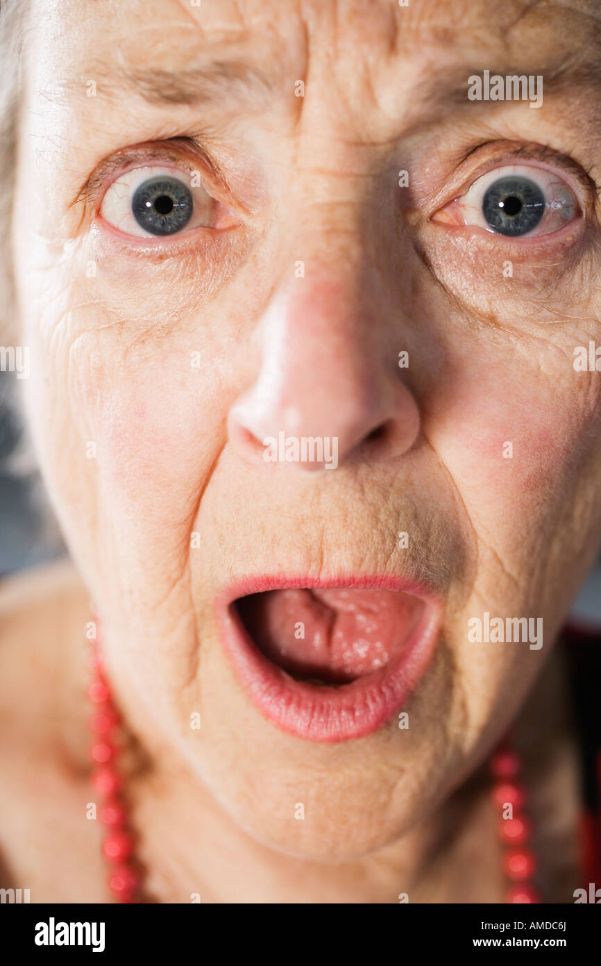 Portrait of a shocked senior woman Stock Photo - Alamy