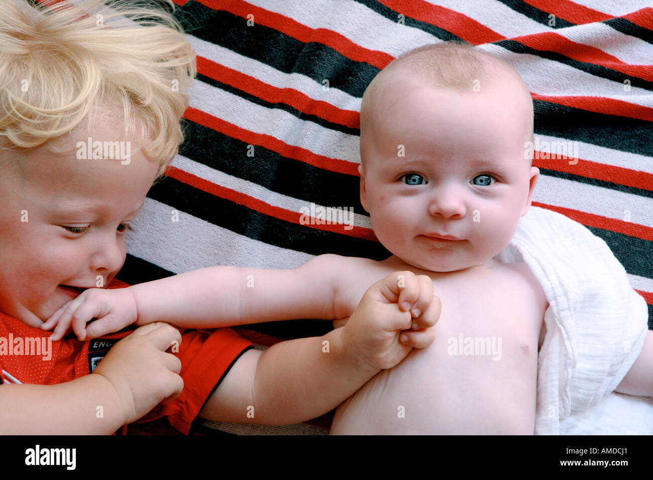 Baby in control Stock Photo - Alamy