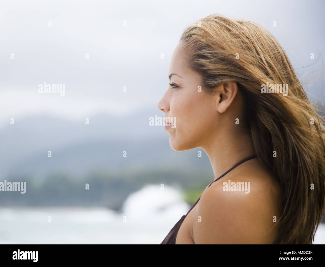 Profile of woman outdoors Stock Photo - Alamy