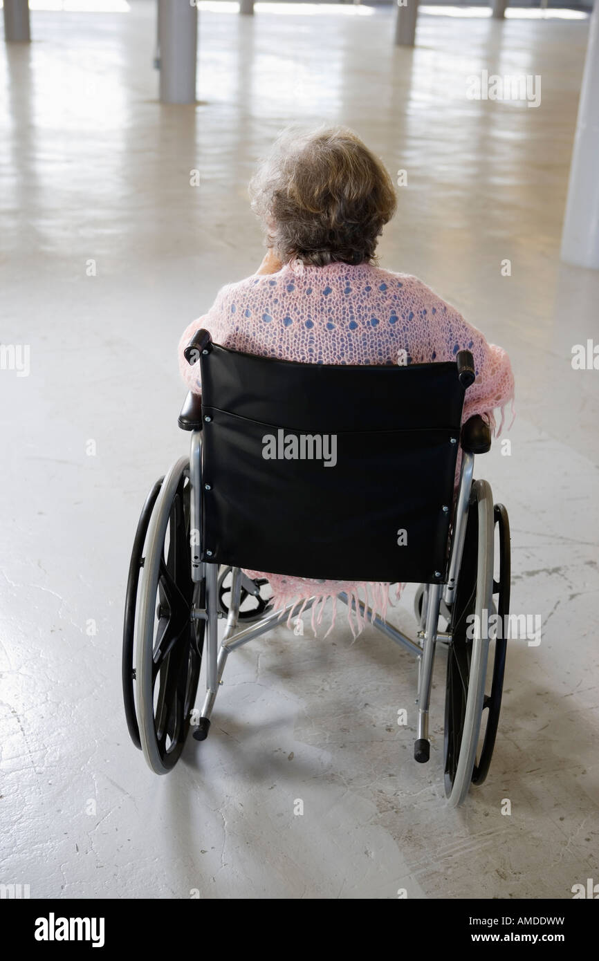 Rear view of an old woman sitting in the wheel chair Stock Photo - Alamy