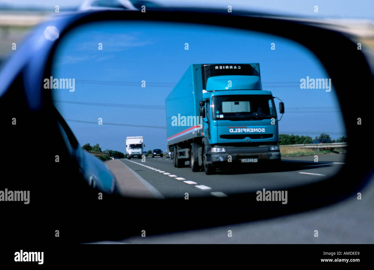 Delivery truck seen in a car rear view mirror, England, UK Stock Photo ...