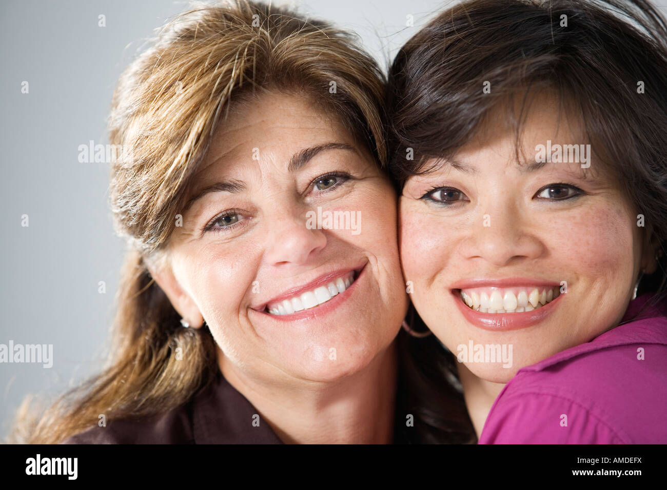 Portrait of two friends smiling Stock Photo - Alamy
