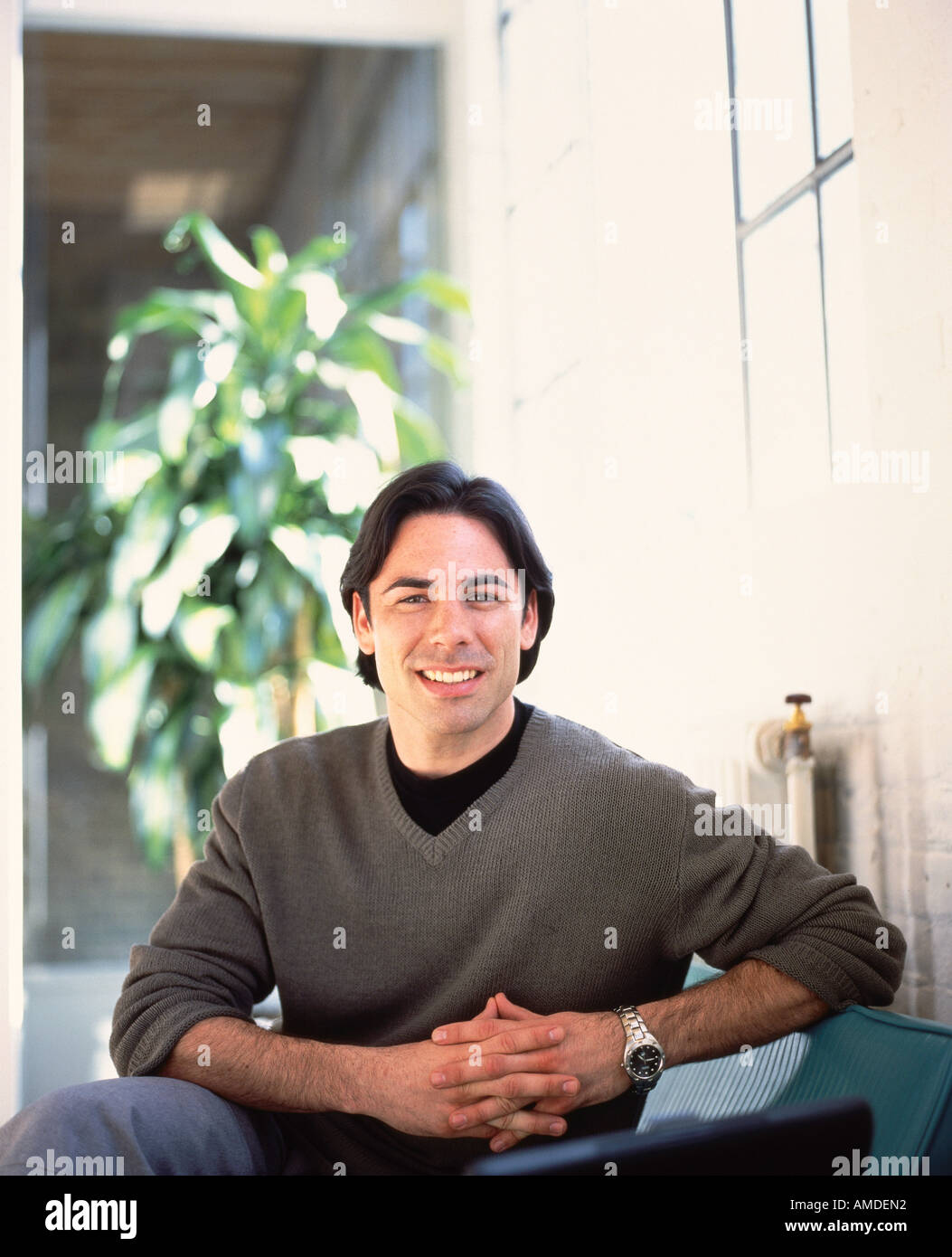 Man Sitting Down Facing Camera High Resolution Stock Photography and ...