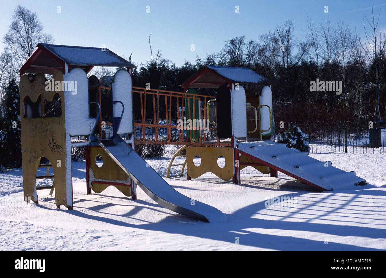 Childrens playground in the snow, Heston Park West London England UK ...