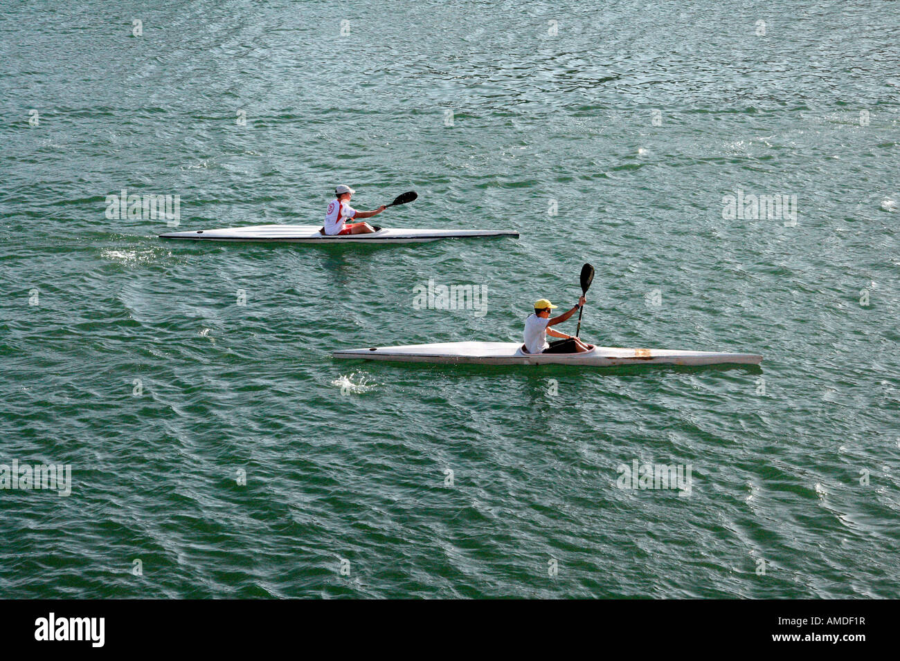 two boys doing conoe practice sport and athletes concepts Stock Photo ...