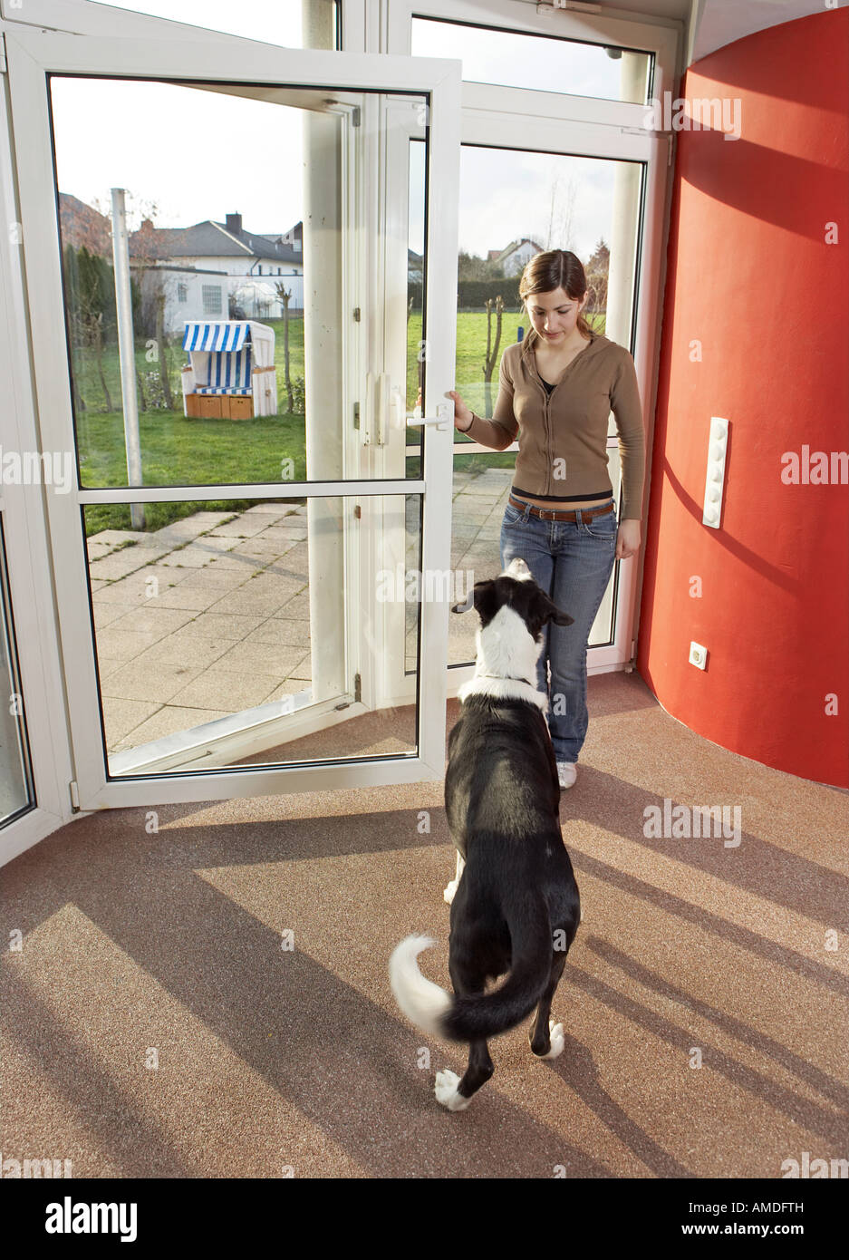 woman and half breed dog Stock Photo - Alamy