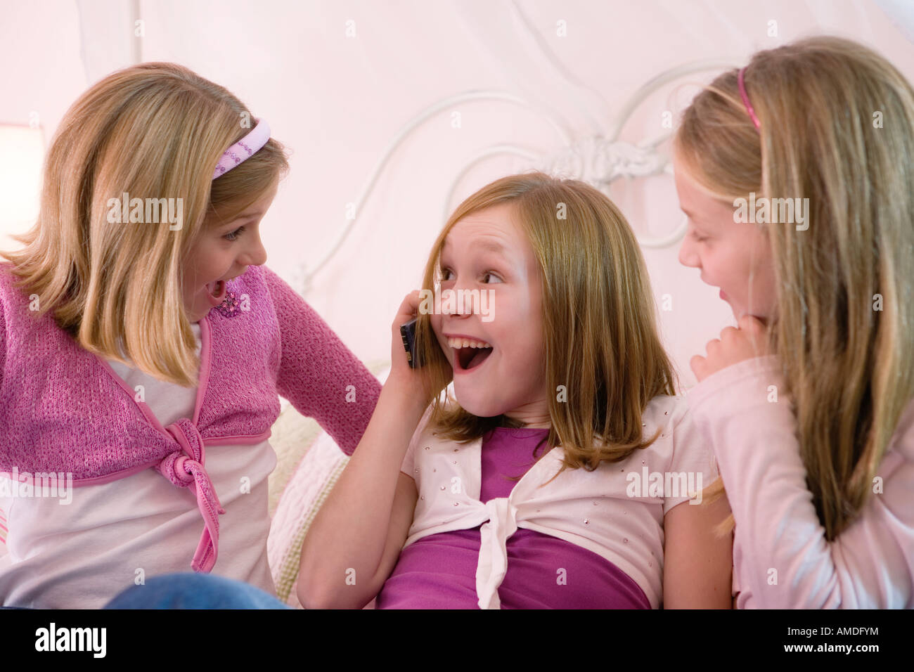 View of three surprised girls Stock Photo - Alamy