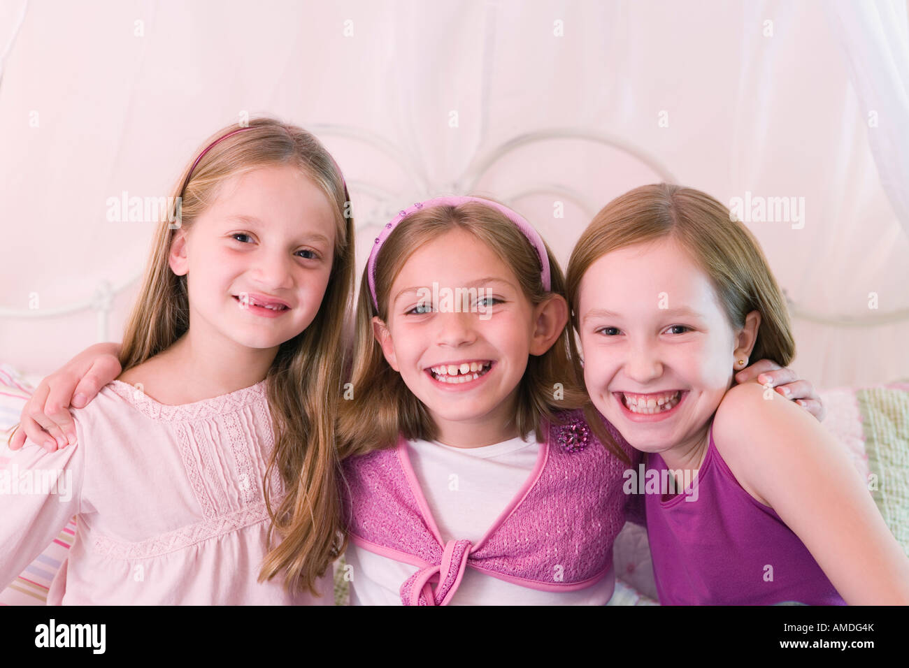 Portrait of cheerful girls smiling Stock Photo - Alamy