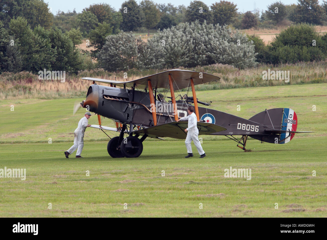 Old plane on ground with crew Old Warden Bedfordshire Stock Photo - Alamy