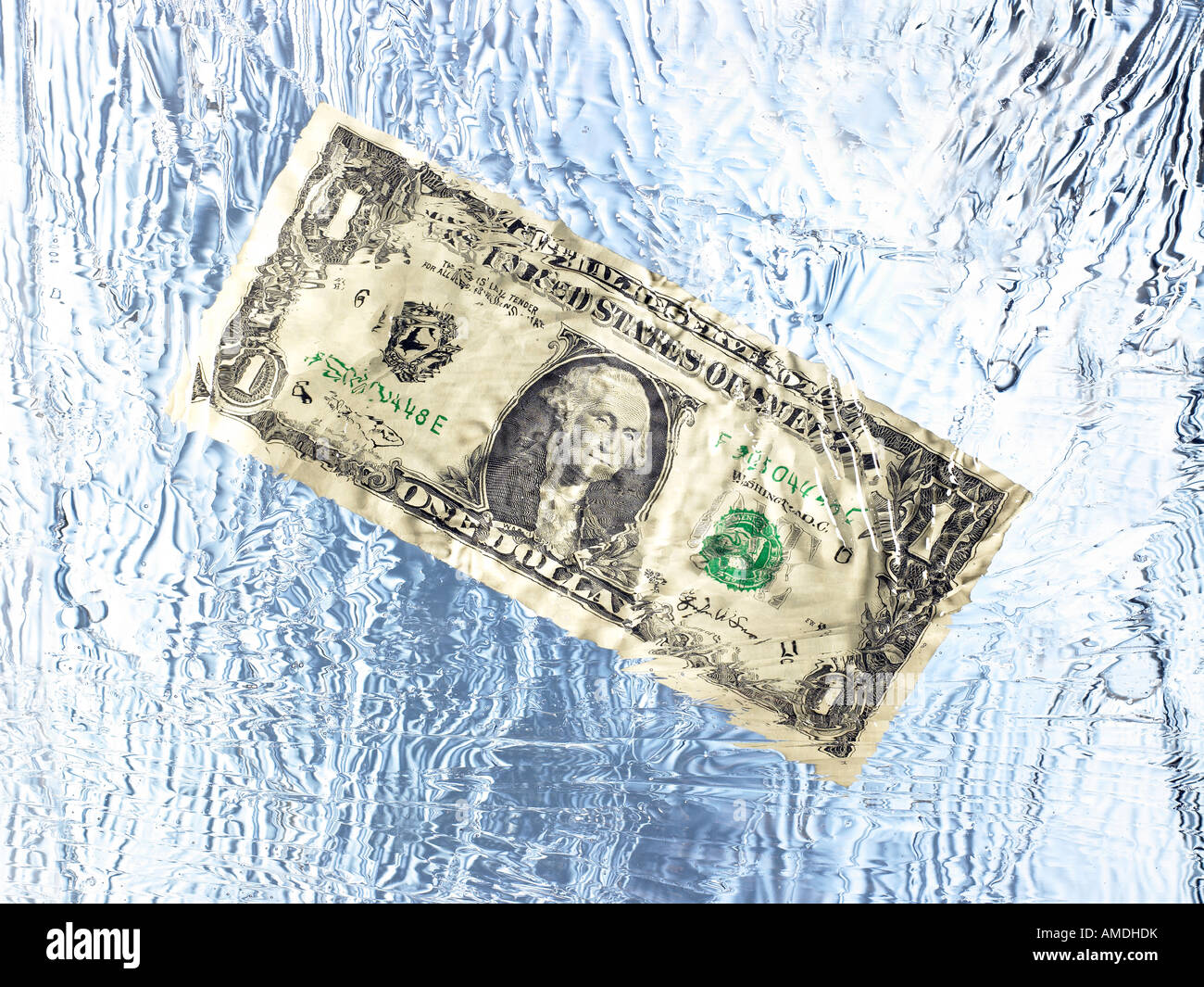 Money frozen dollars hi-res stock photography and images - Alamy