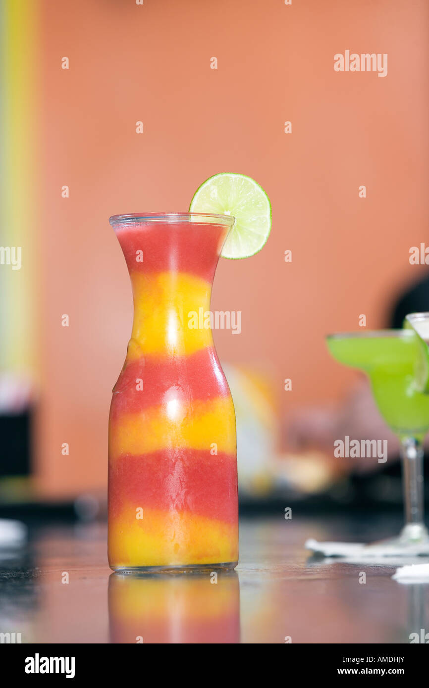 Close up of a decanter filled with cocktail on the bar counter Stock ...