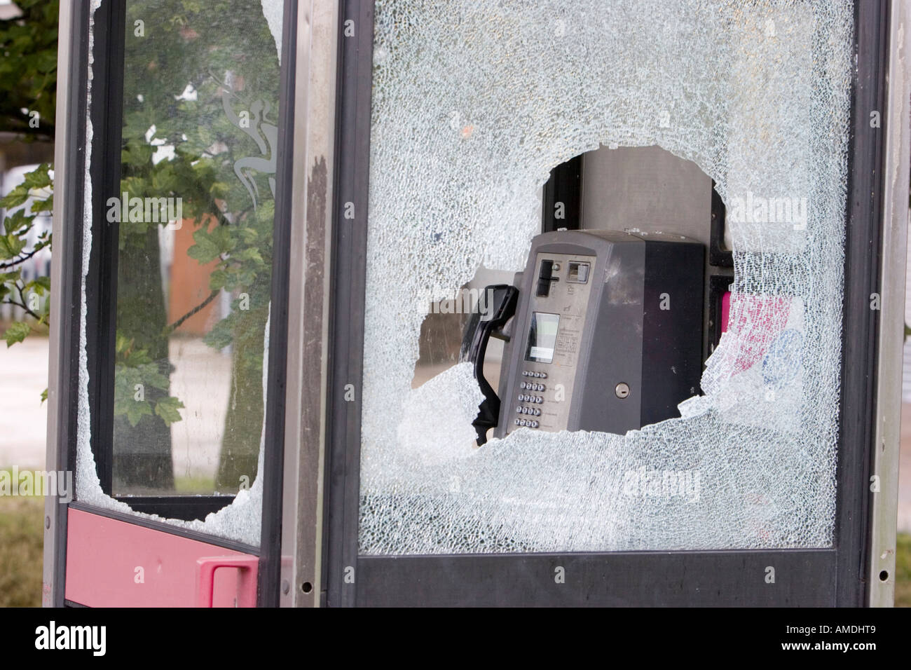 Smashed and vandalised telephone box Stock Photo - Alamy