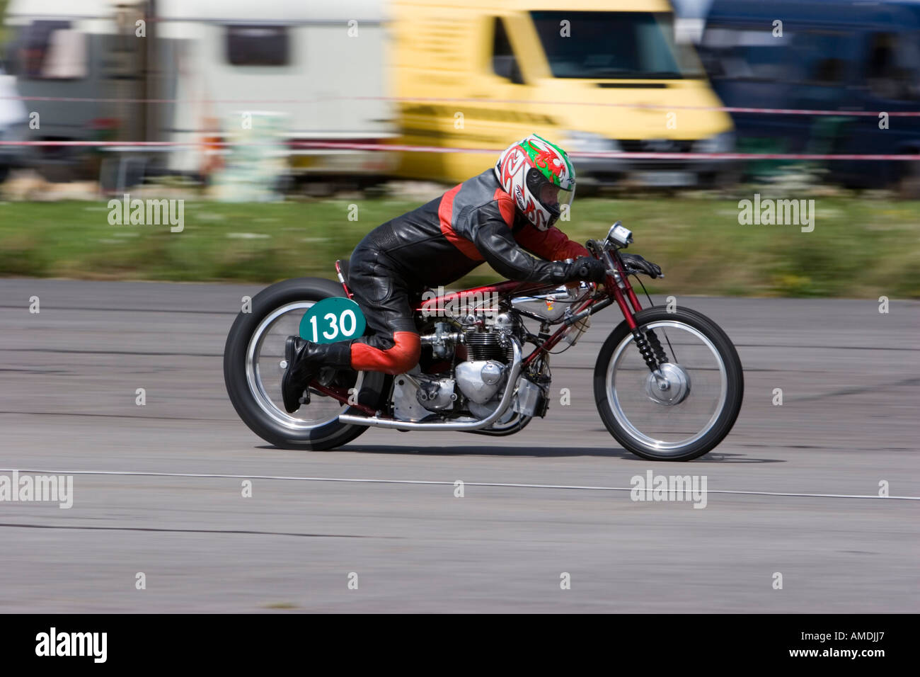 Racing vintage motorcycles on old airfield runway Stock Photo - Alamy