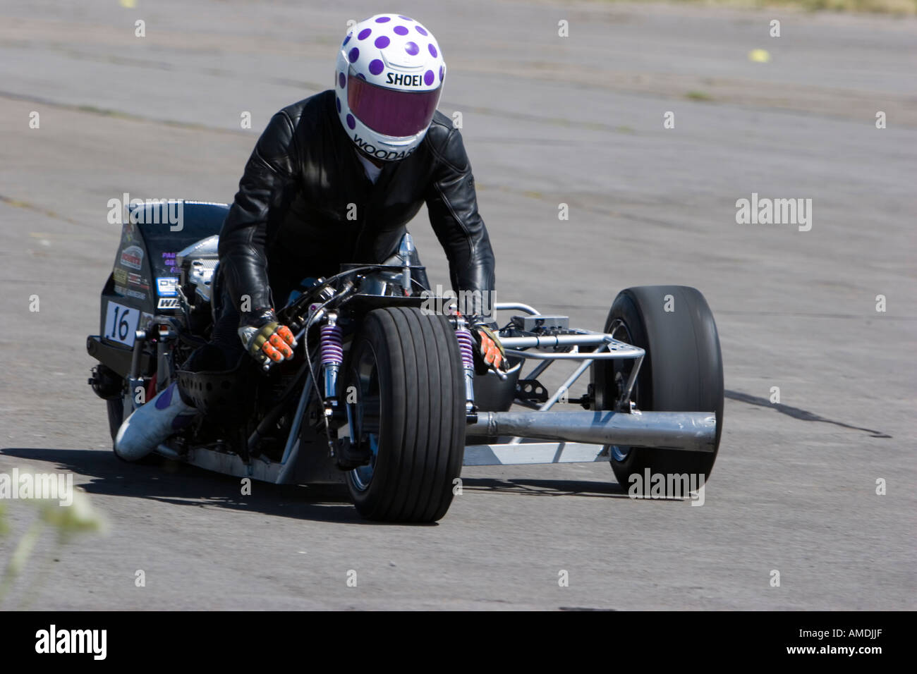 Racing vintage motorcycles on old airfield runway Stock Photo - Alamy
