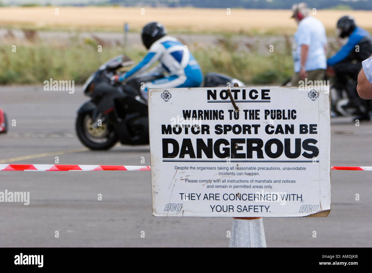 Racing vintage motorcycles on old airfield runway Stock Photo - Alamy