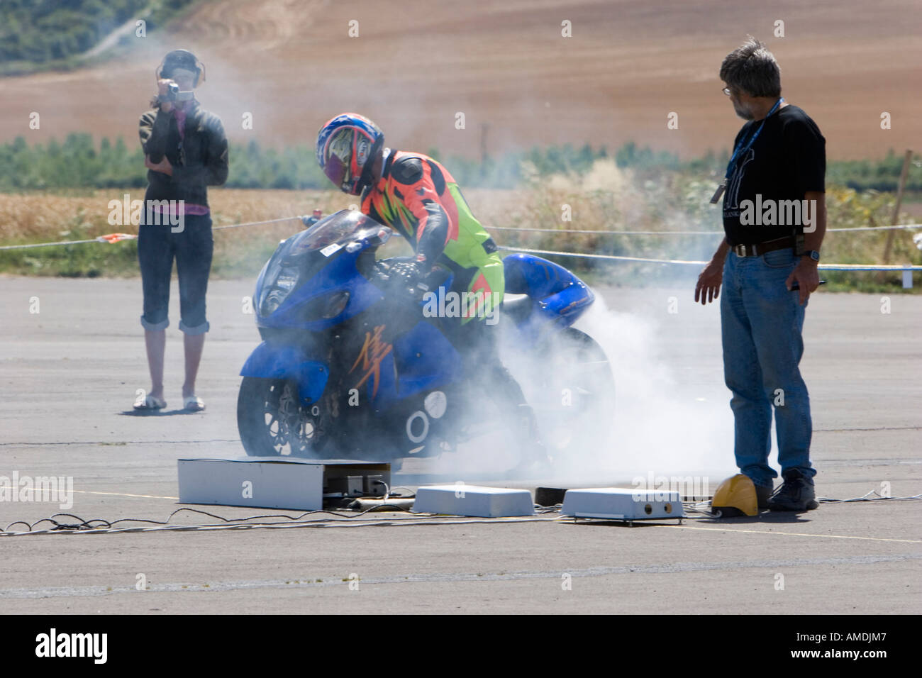 Racing vintage motorcycles on old airfield runway Stock Photo - Alamy